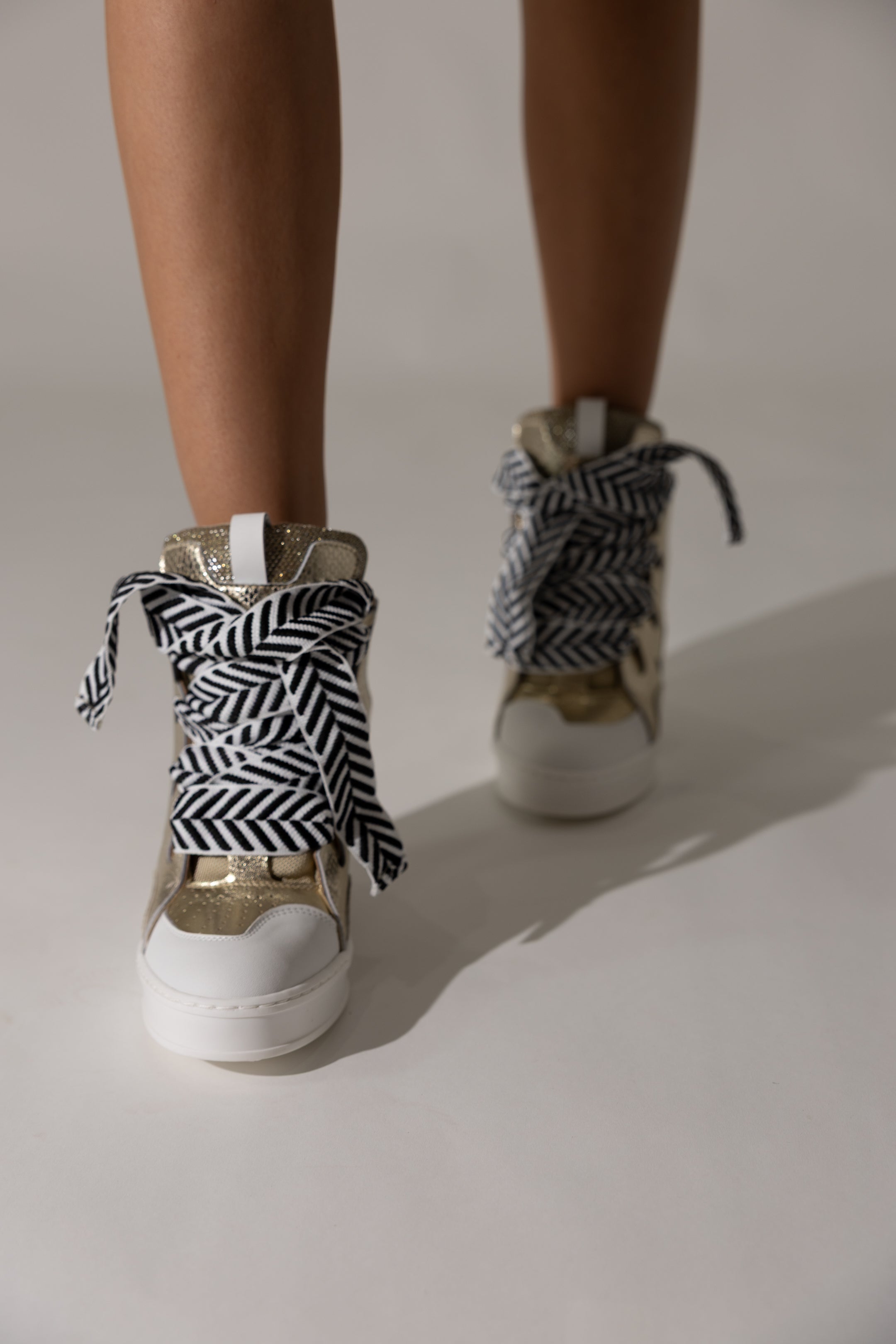 Courageous Gold Metallic High Top Wedge Sneaker – CynthiaRichard
